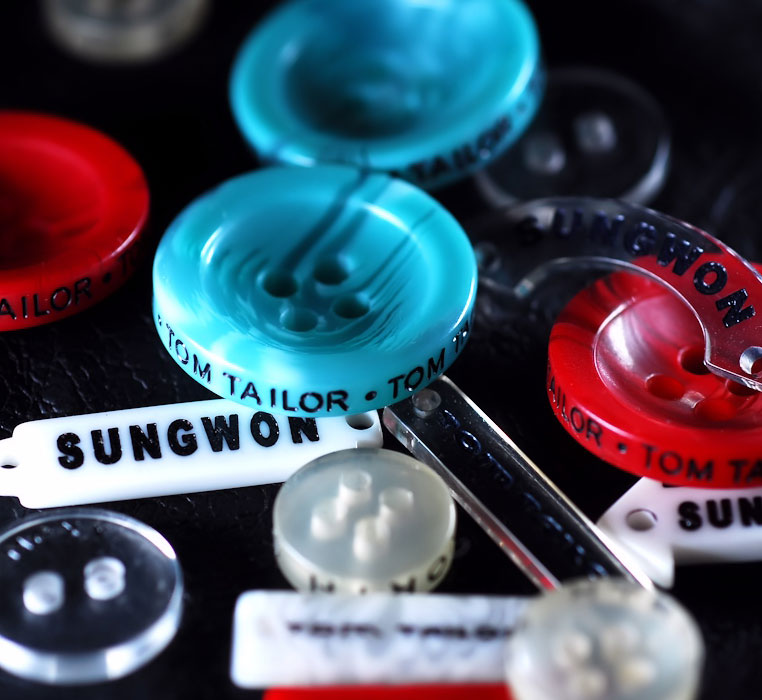 Laser Engraving and Colored Logos | Sungwon Button